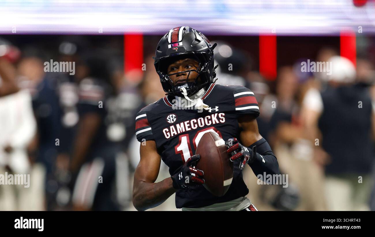 South Carolina wide receiver Malik Clark (13) warms up before an NCAA ...