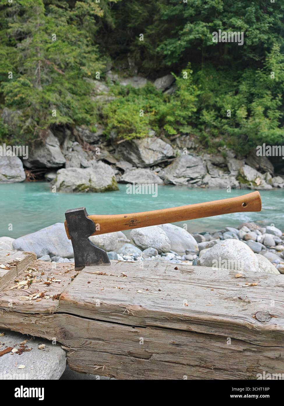 an axe or ax for woodwork, a tool in forestry an axe or ax for woodwork ...