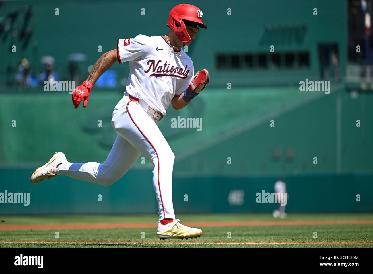 Washington Nationals' Daylen Lile runs to home to score the second run ...