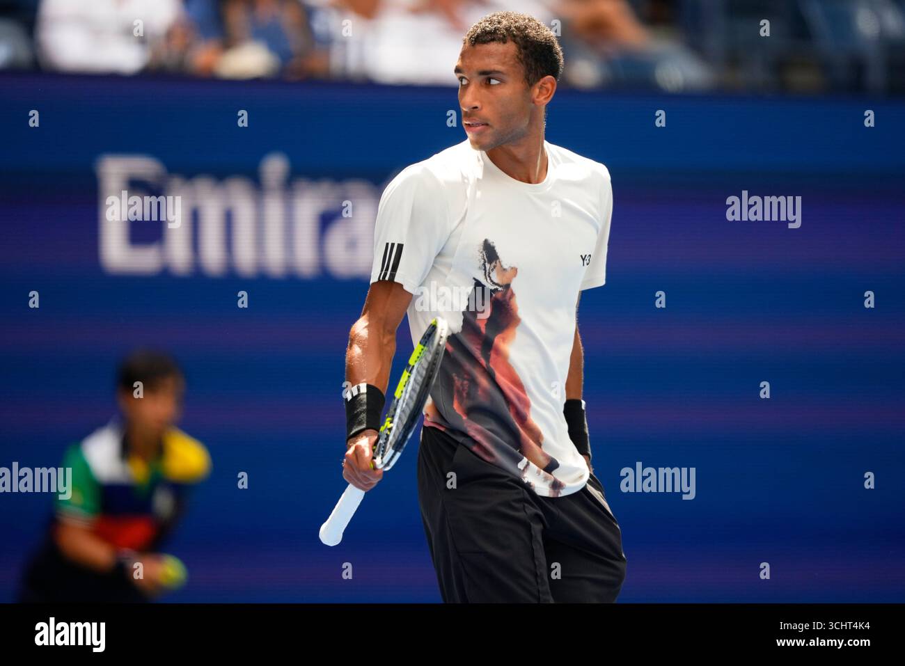 Felix Auger-Aliassime, of Canada, prepares to serve to Alex de Minaur, of Australia,during the ...