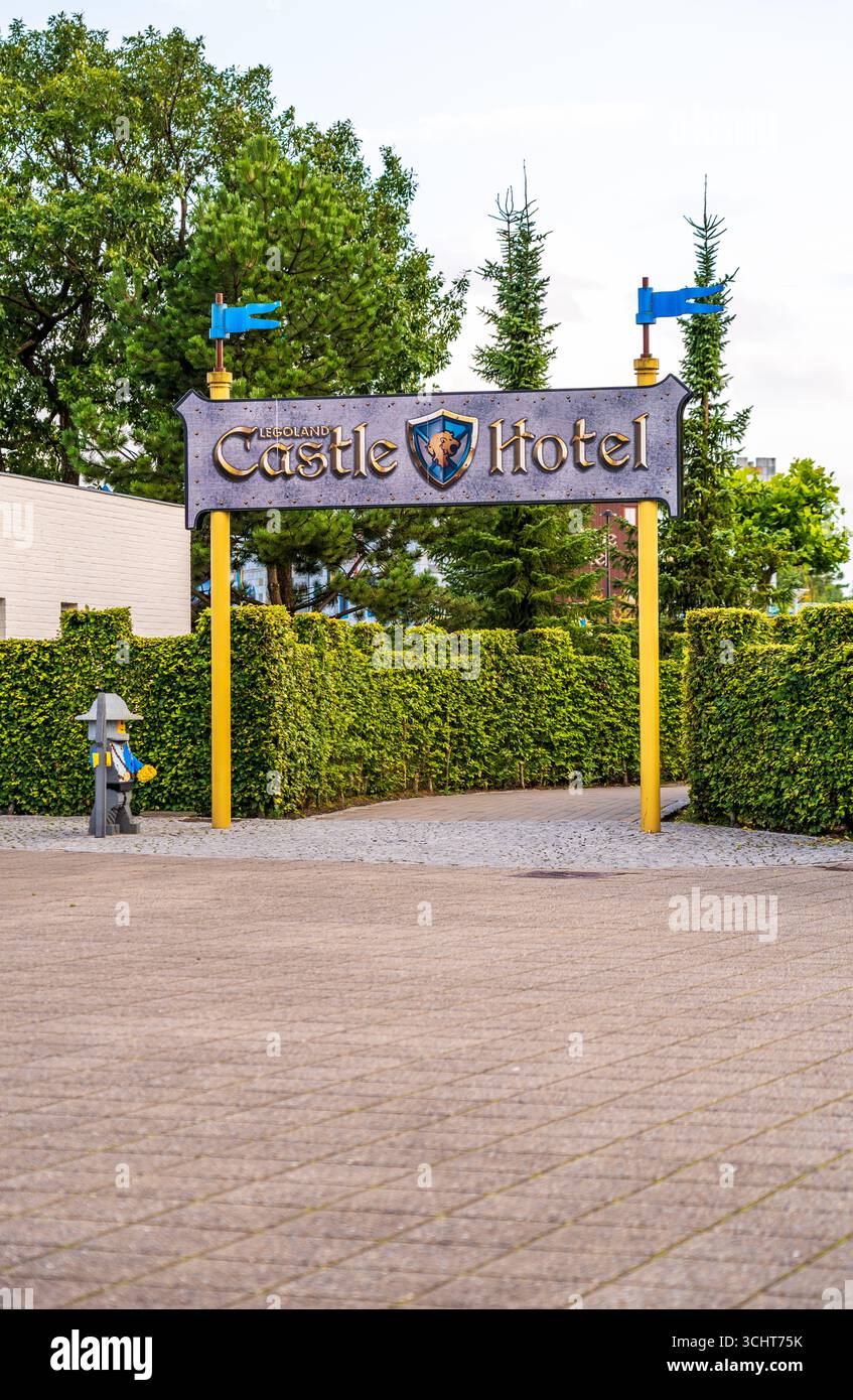Visitors approach the enchanting Legoland castle hotel through a ...