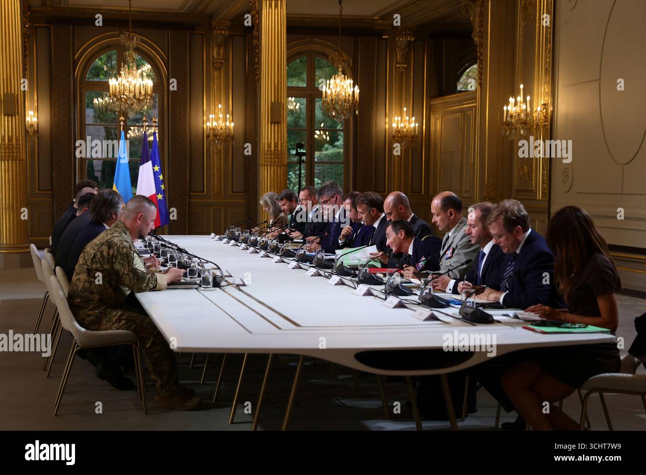 France's President Emmanuel Macron, center right, attends a meeting ...