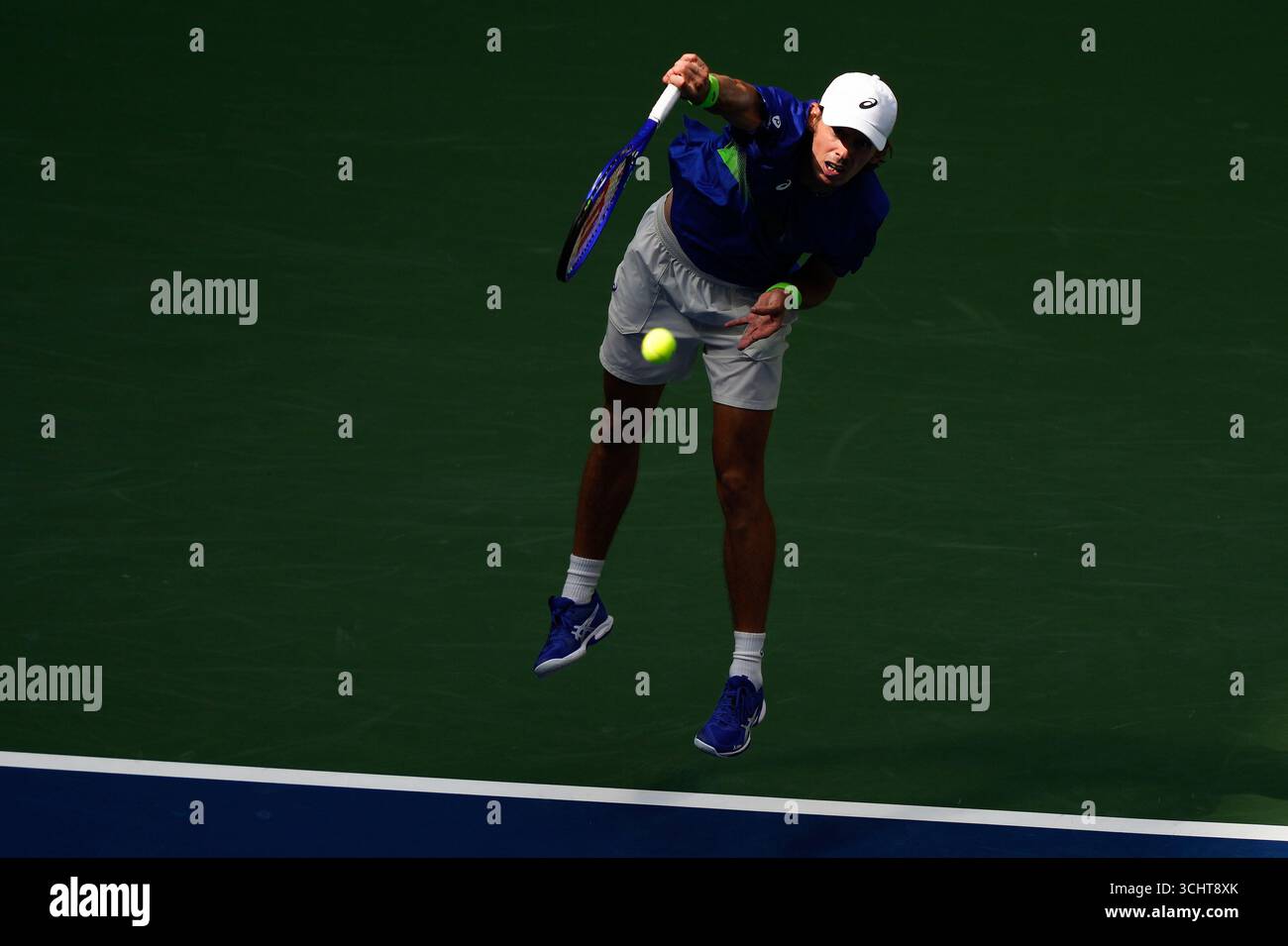Alex de Minaur, of Australia, serves to Felix Auger-Aliassime, of Canada, during the ...