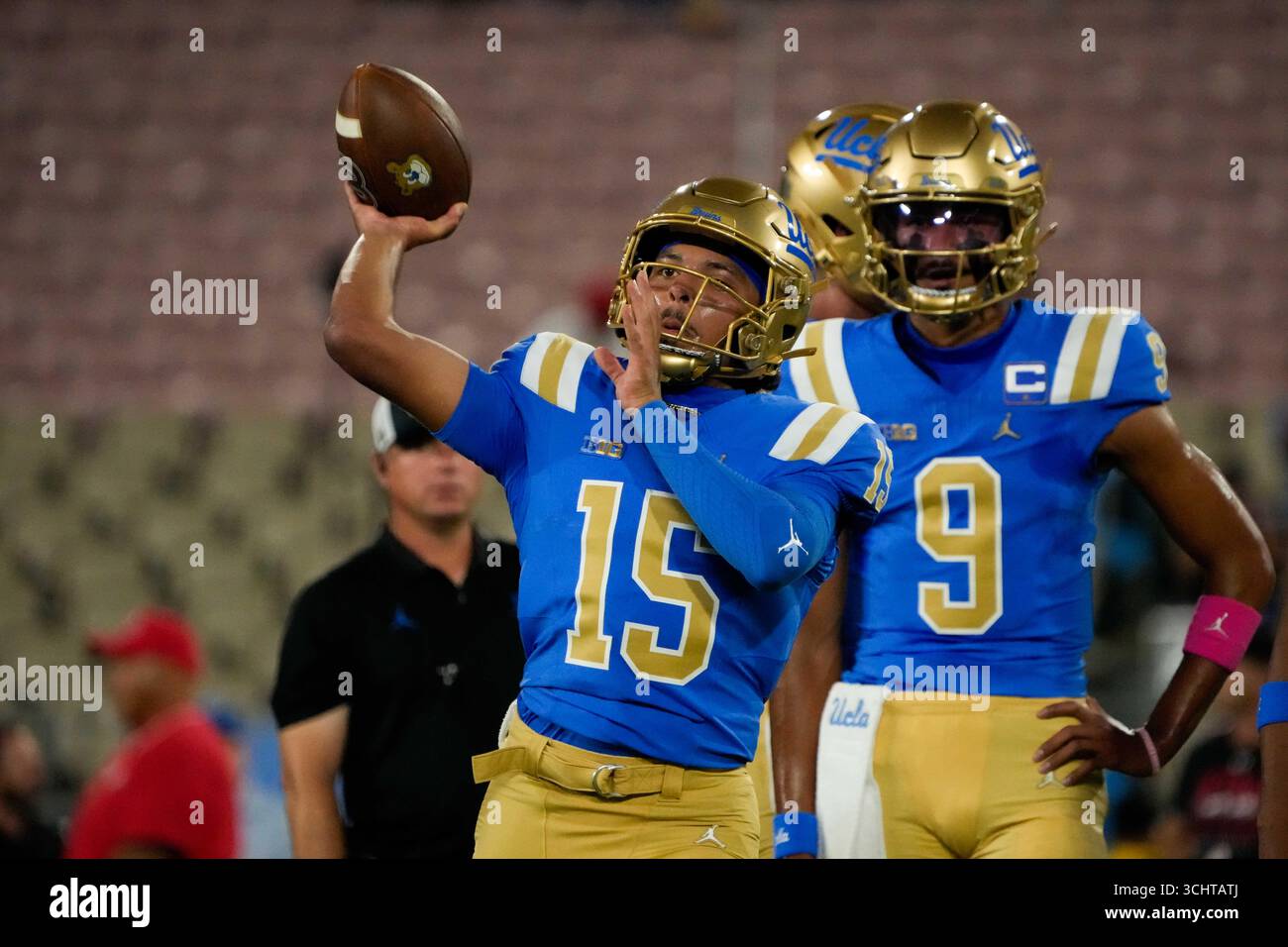 UCLA Bruins quarterback Pierce Clarkson (15) warms up before an NCAA ...