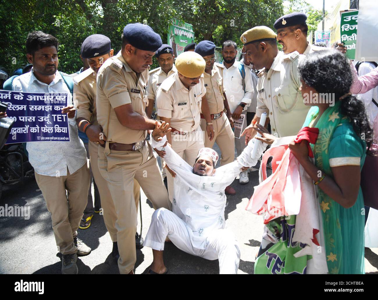 PATNA, INDIA - SEPTEMBER 3: Police detain Urdu TET aspirants demonstrating over pending results ...