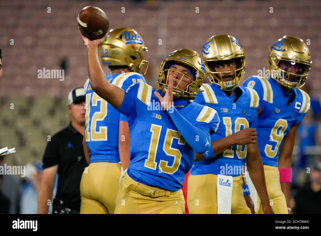 UCLA Bruins quarterback Pierce Clarkson (15) warms up before an NCAA ...
