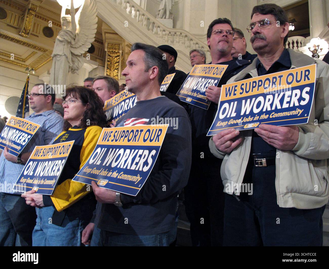 FILE - Laid-off workers from a Philadelphia-area ConocoPhillips oil ...
