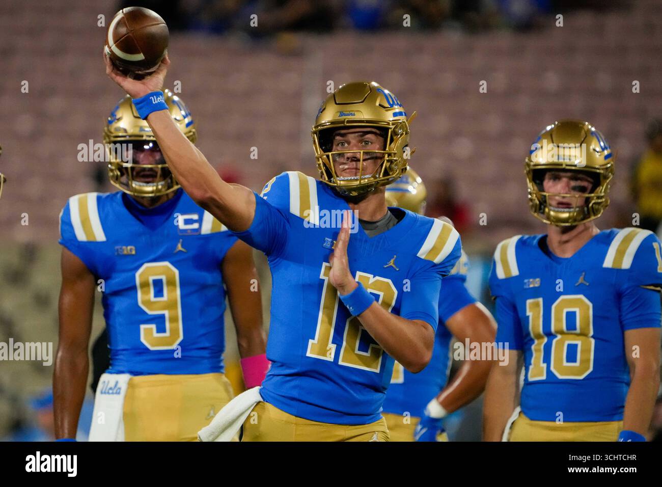UCLA Bruins quarterback Luke Duncan (12) warms up before an NCAA ...