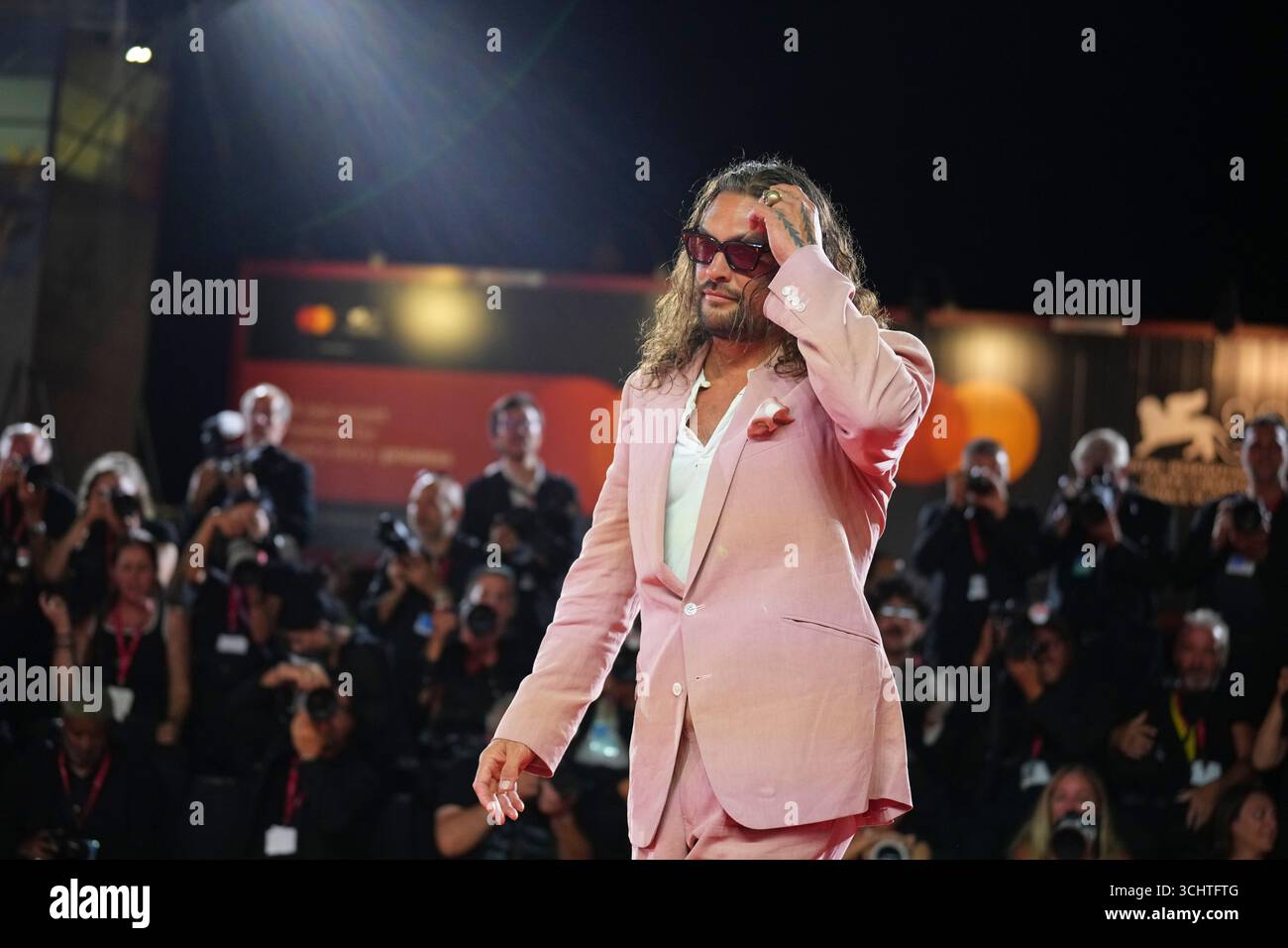 Jason Momoa poses for photographers on the red carpet for the film 'In ...