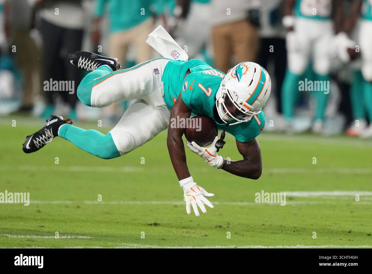 Miami Dolphins wide receiver Tahj Washington (7) gets a first down ...