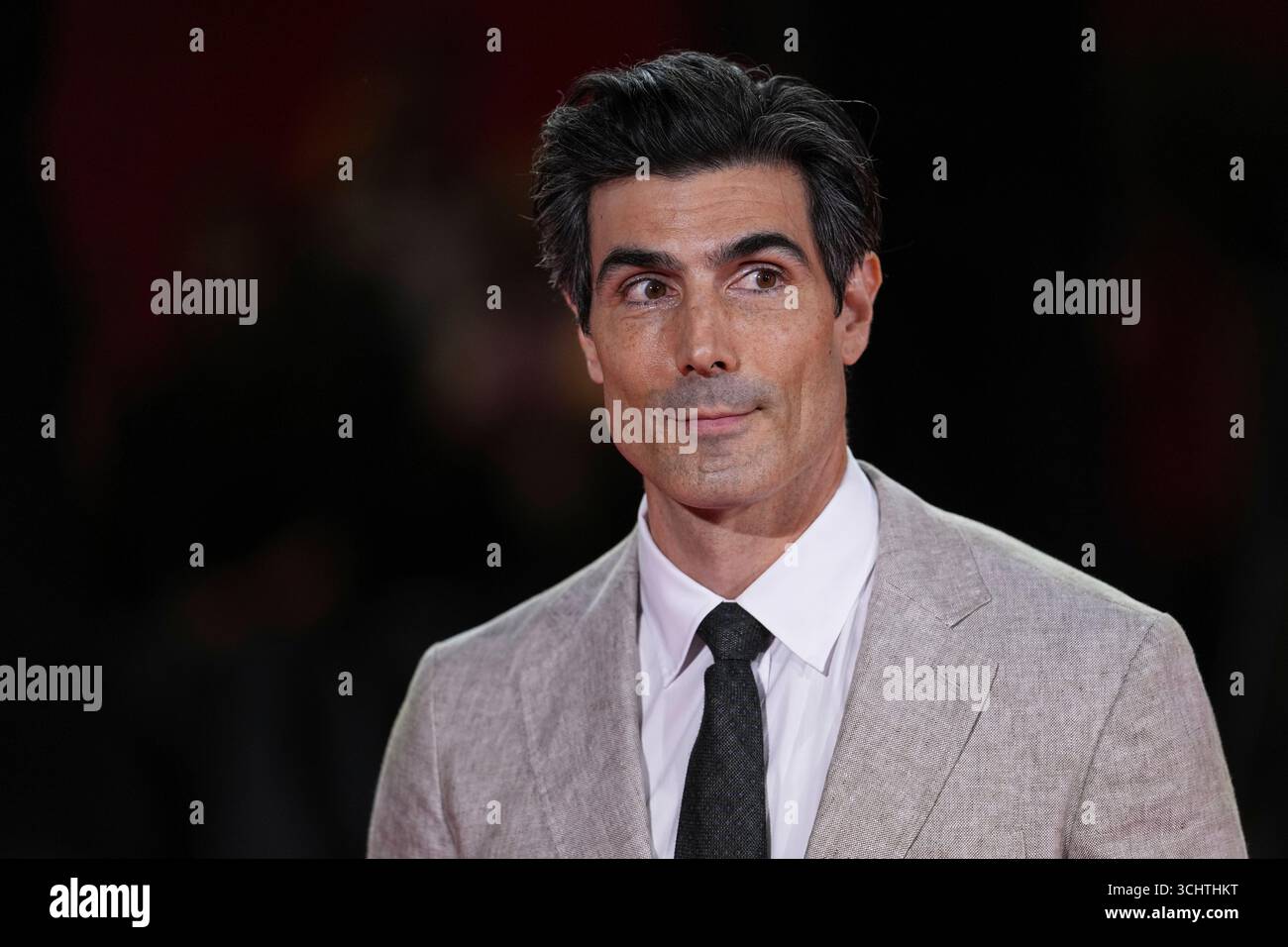 Louis Cancelmi poses for photographers on the red carpet for the film ...
