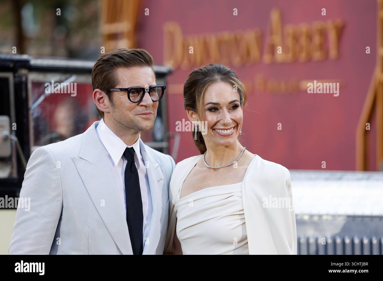 Allen Leech, left, and Jessica Blair Herman pose for photographers upon ...