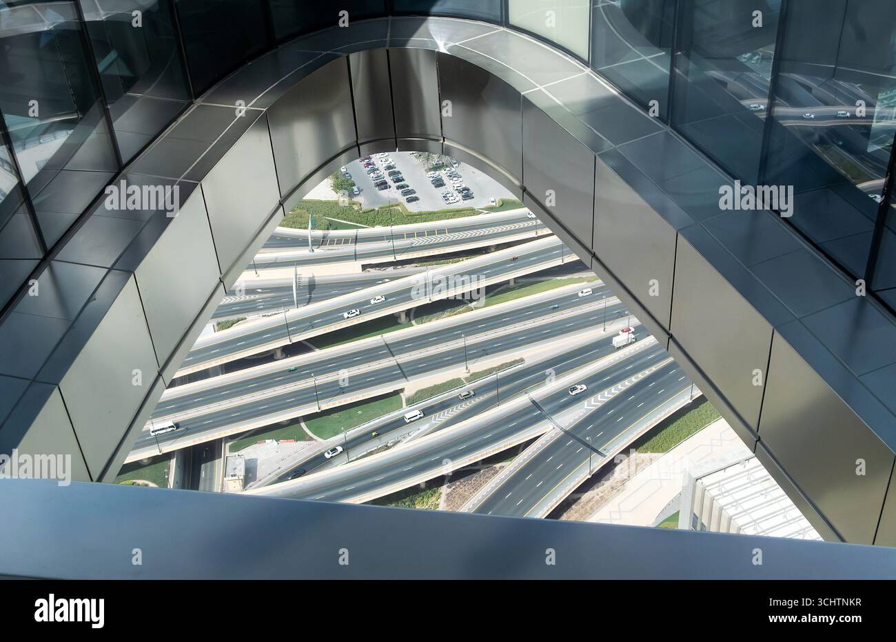 View of intricate highway interchange from a glass floor modern Dubai ...