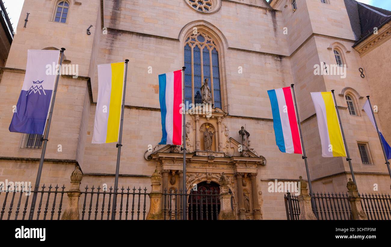 LUXEMBOURG, EUROPE - SEPTEMBER 1, 2025 - Luxembourg City flags waving ...