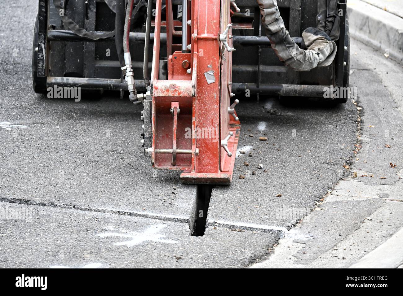 IRIVNE, CALIFORNIA - 09 SEPT 2025: A Ditch Witch Trencher cutting a ...