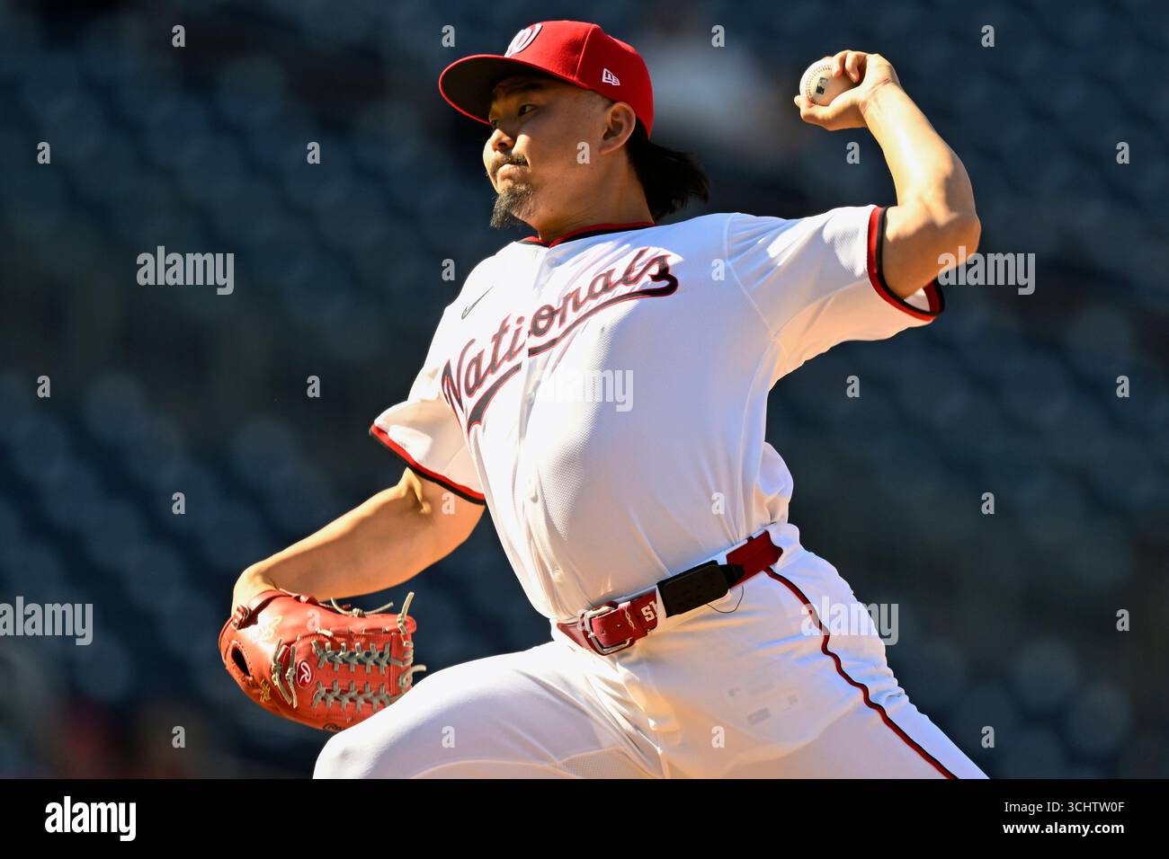Washington Nationals relief pitcher Shinnosuke Ogasawara throws during ...