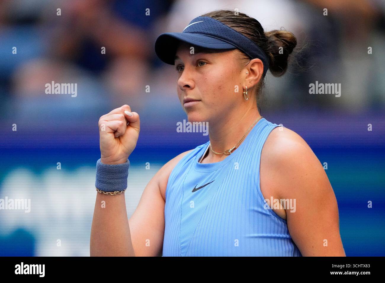Amanda Anisimova, of the United States, reacts after scoring a point ...
