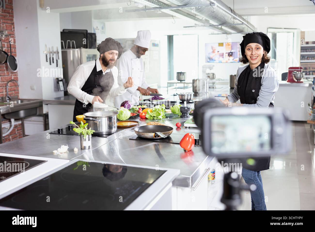 Diverse culinary team recording hi-res stock photography and images - Alamy