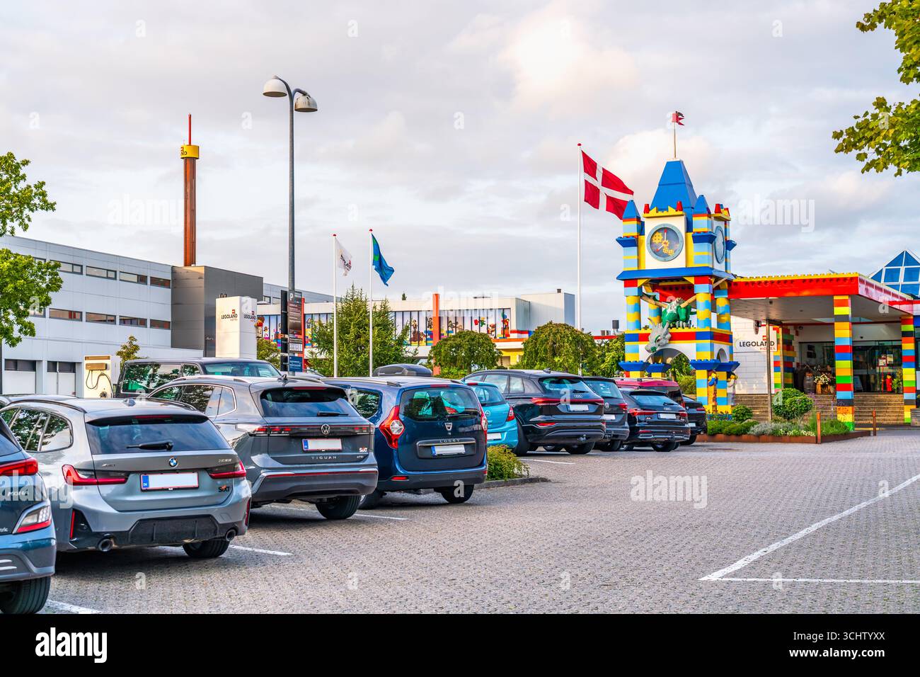 Parking spaces are filled with cars as visitors arrive at the Legoland ...