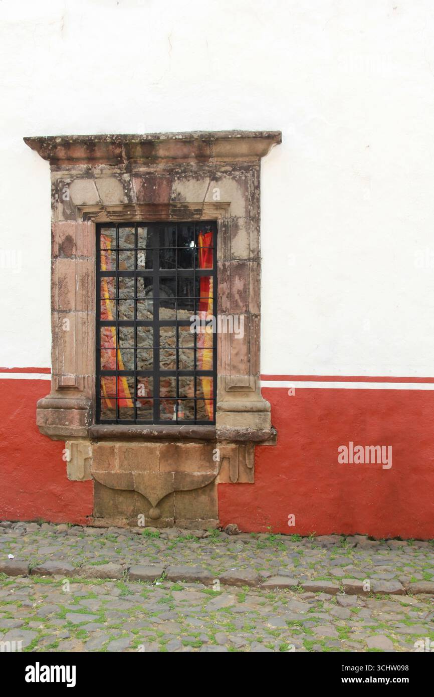 Cobblestone colonial streets of Patzcuaro, Michoacan, Mexico with white ...