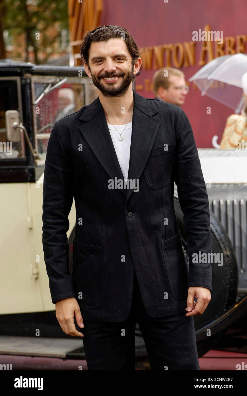 Michael C. Fox poses for photographers upon arrival at the world ...