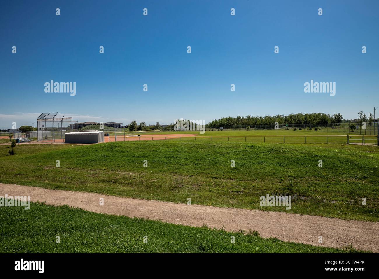 Bright summer photo of Macon Baseball Fields featuring green outfields ...
