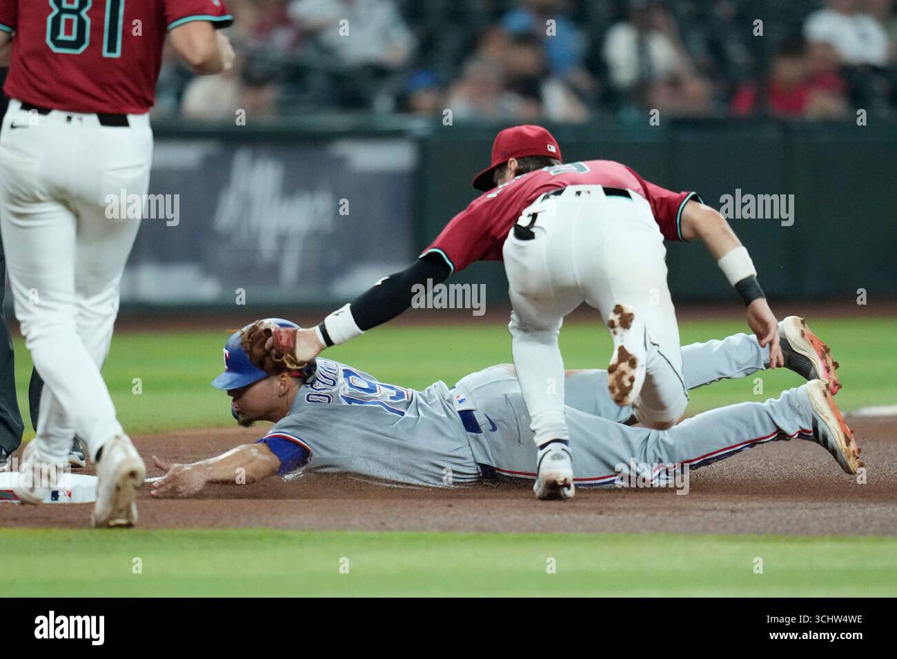 Arizona Diamondbacks shortstop Blaze Alexander tags out Texas Rangers ...