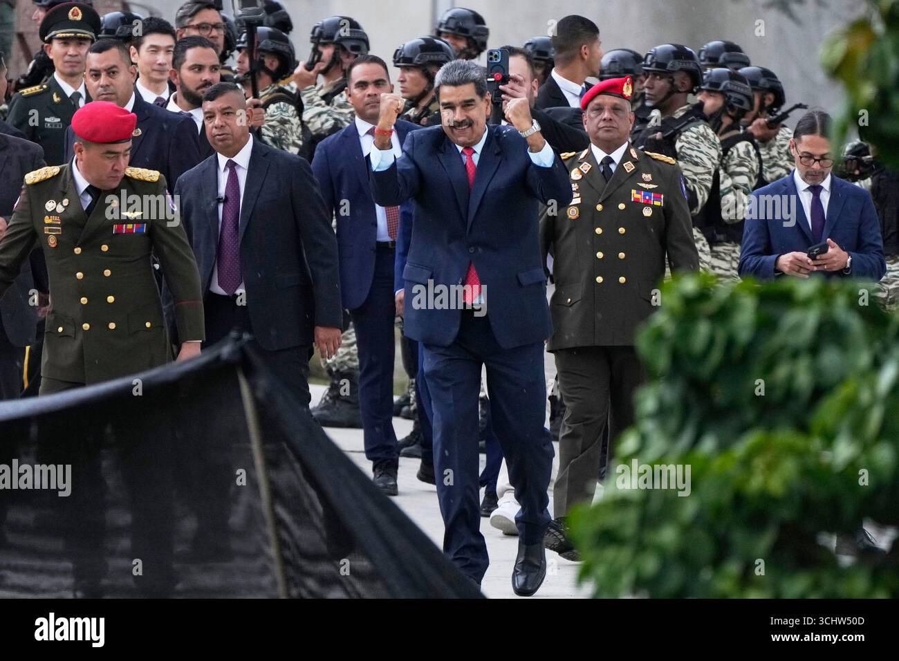 President Nicolas Maduro gestures to supporters during the inauguration ...