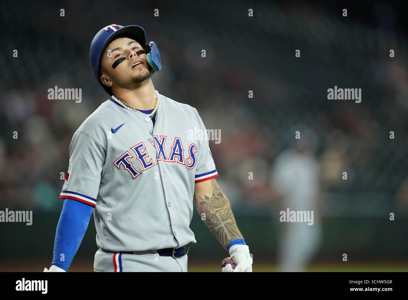 Texas Rangers' Cody Freeman reacts after striking out against the ...