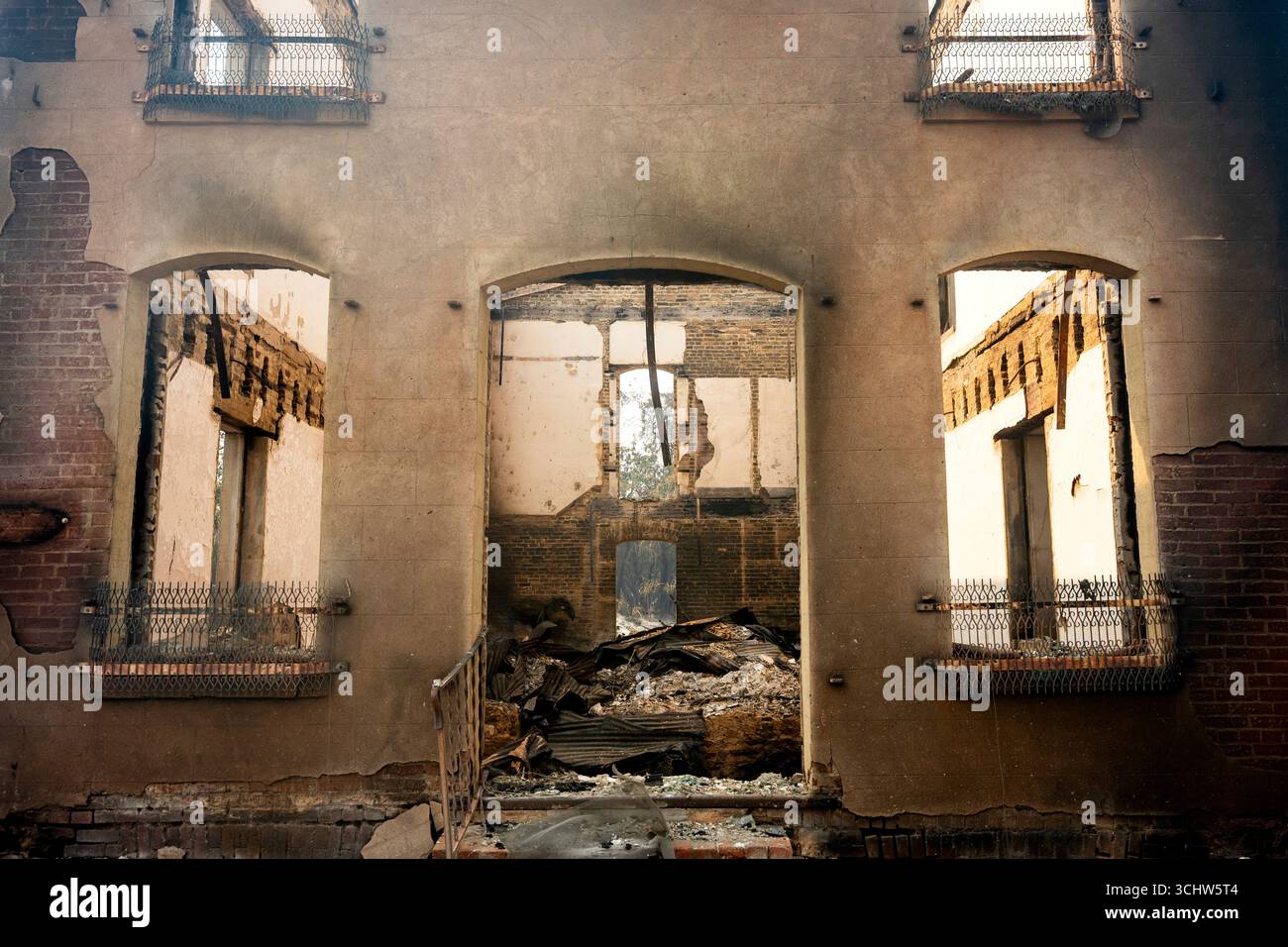 Exterior walls stand at a building scorched by the TCU September ...