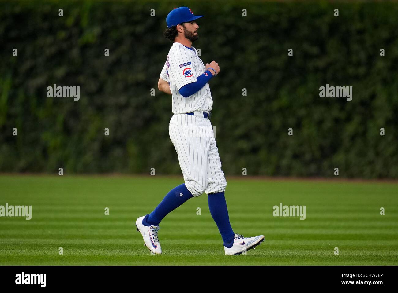 Chicago Cubs shortstop Dansby Swanson warms up before a baseball game ...