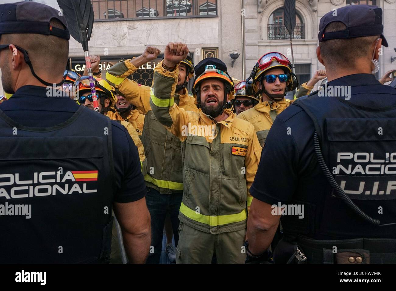 Forest firefighters shout slogans during the demonstration. Forest ...