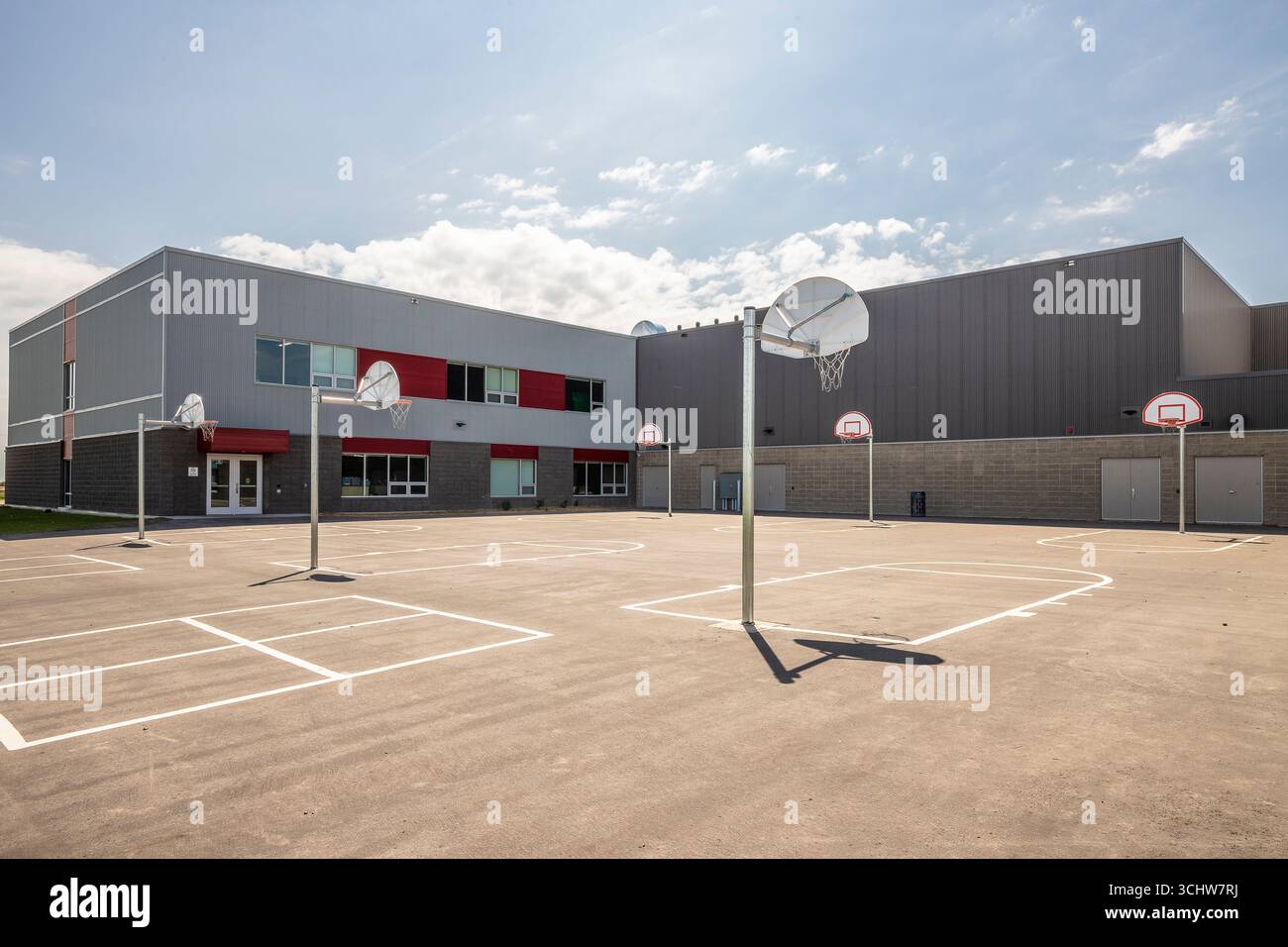 Ground-level photo of École Holy Mary Catholic School highlighting its ...