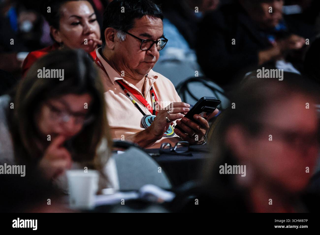 Delegates vote electronically on resolutions at the Assembly of First ...