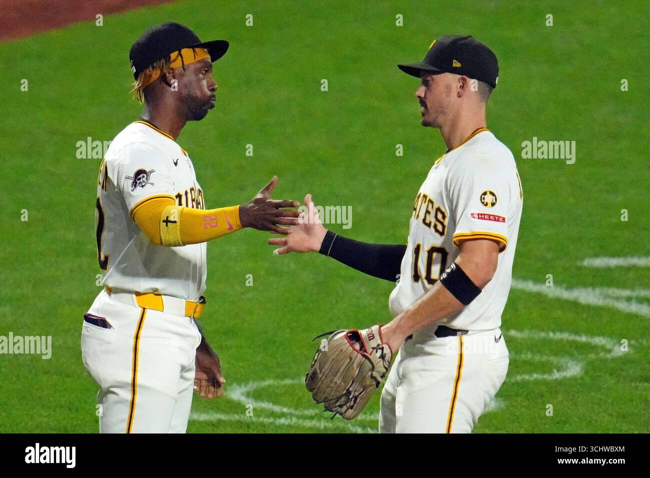 Pittsburgh Pirates' Andrew McCutchen, left, and Bryan Reynolds ...
