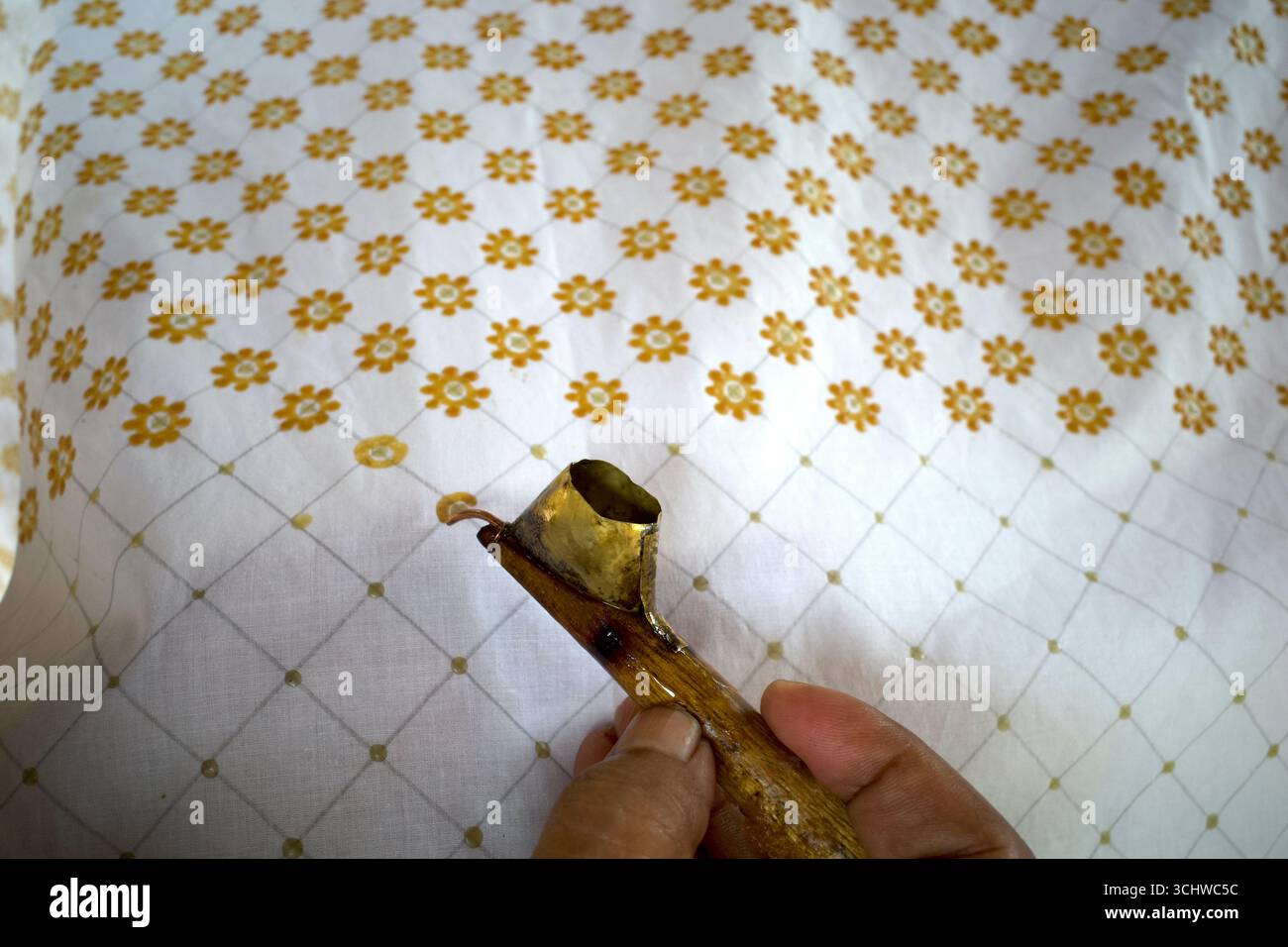 The process of making written batik, a traditional Indonesian clothing ...