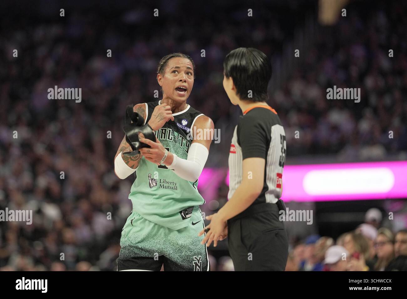 New York Liberty guard Natasha Cloud (9) talking with referee Catherine ...