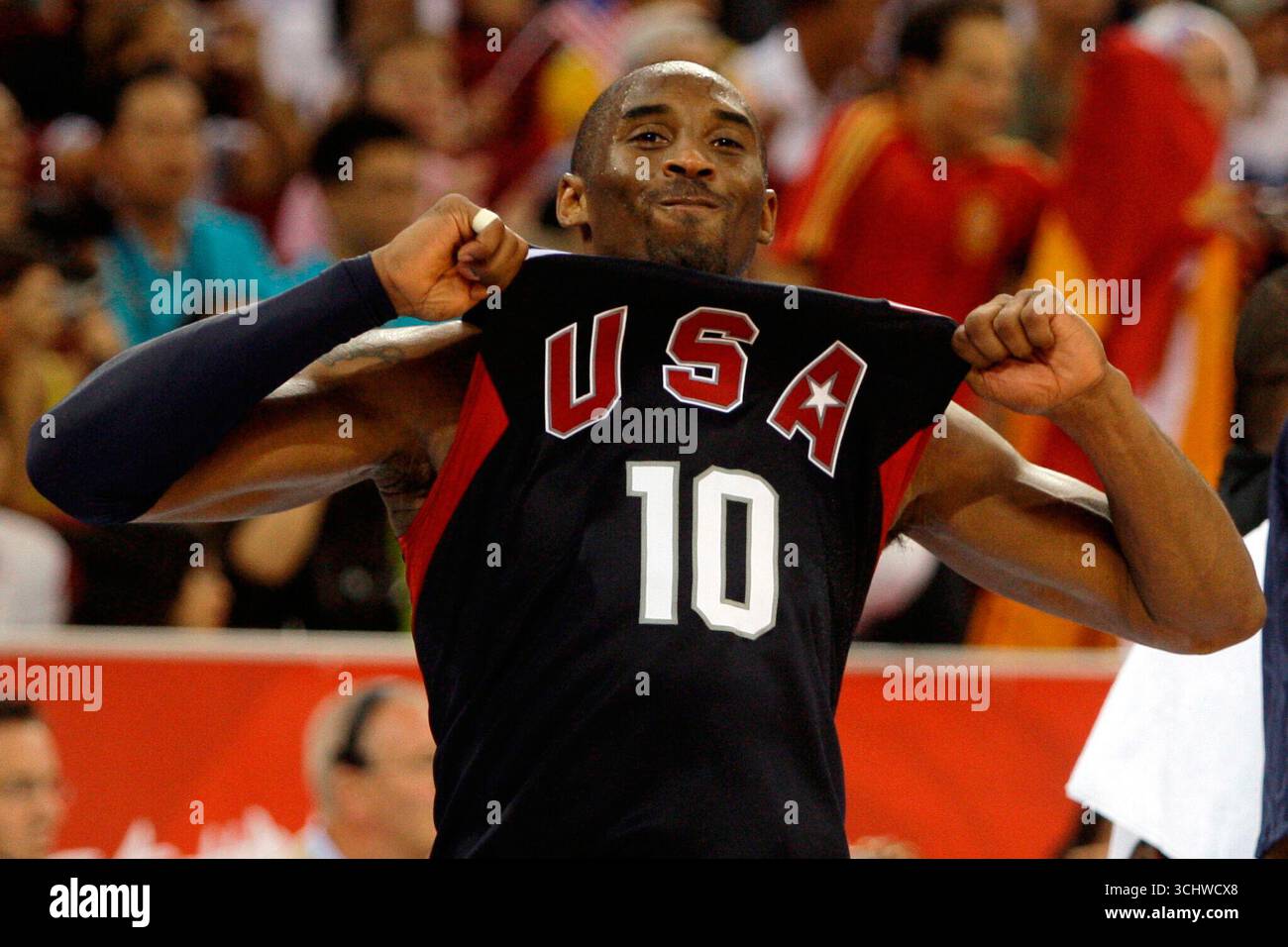 FILE - Team USA's Kobe Bryant pops his shirt as he celebrates after ...