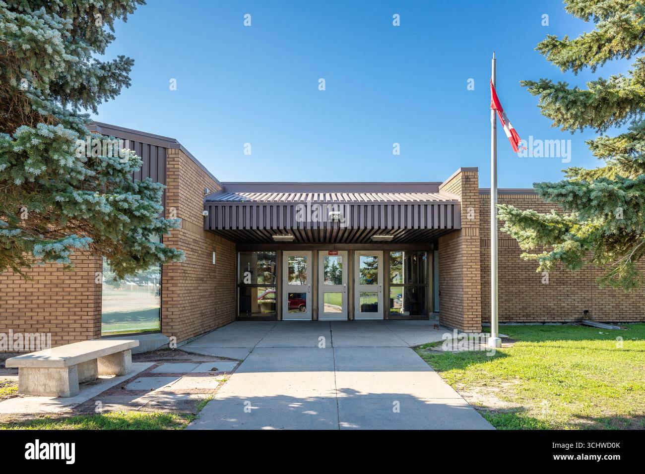 Ground-level photo of Warman Elementary School’s front entrance. The ...