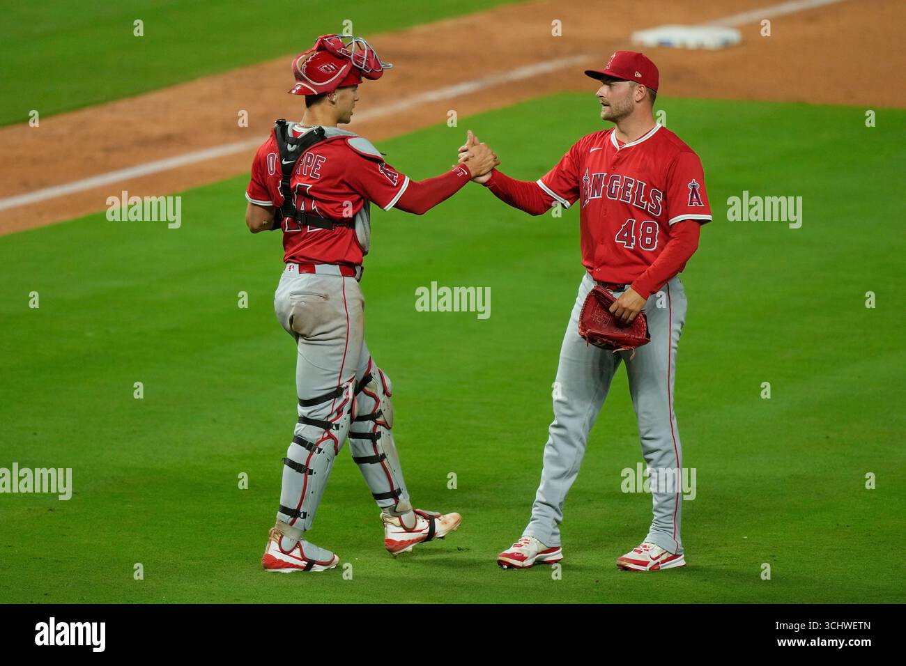 Los Angeles Angels catcher Logan O'Hoppe and relief pitcher Reid ...