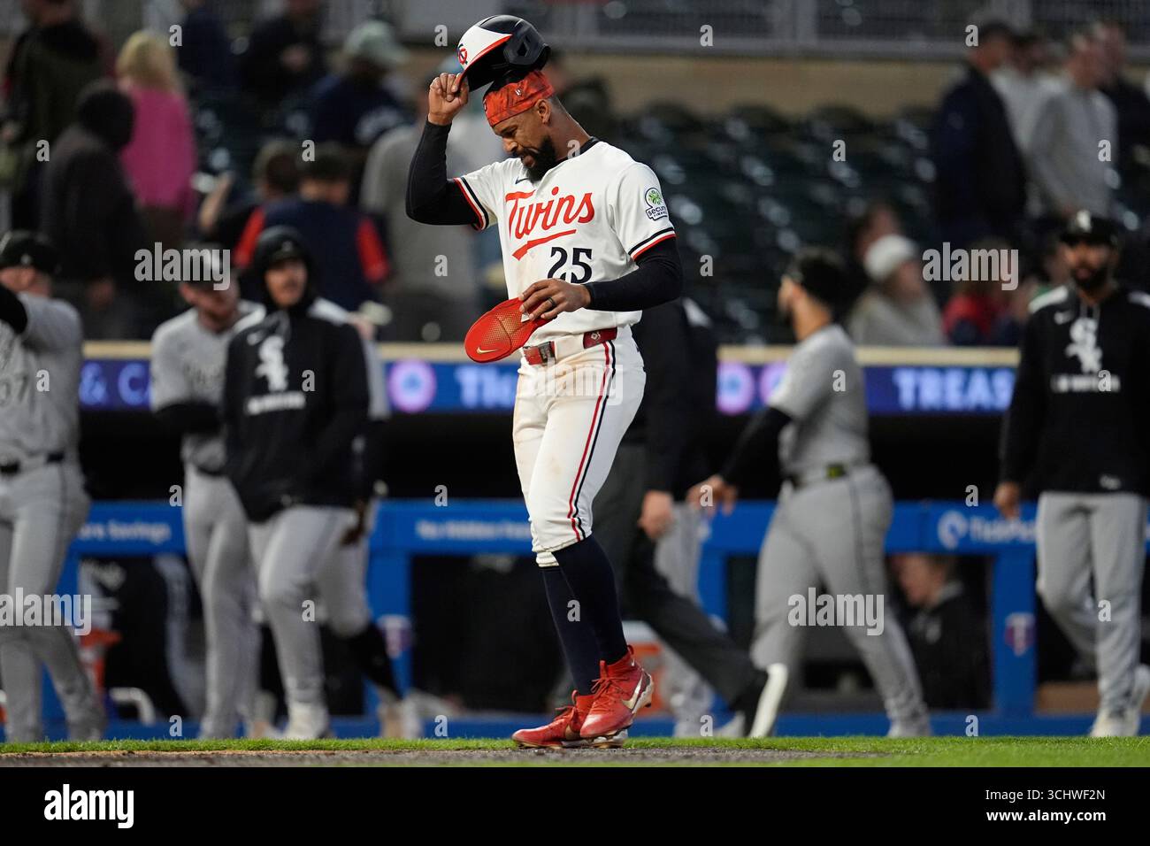 Minnesota Twins' Byron Buxton (25) walks back to the dugout after a ...