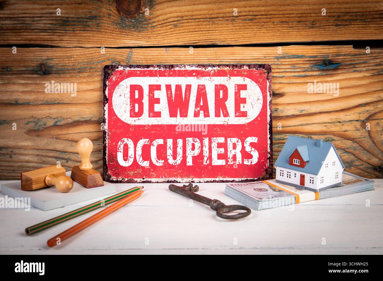 Real estate security concept with beware Occupiers warning sign and ...