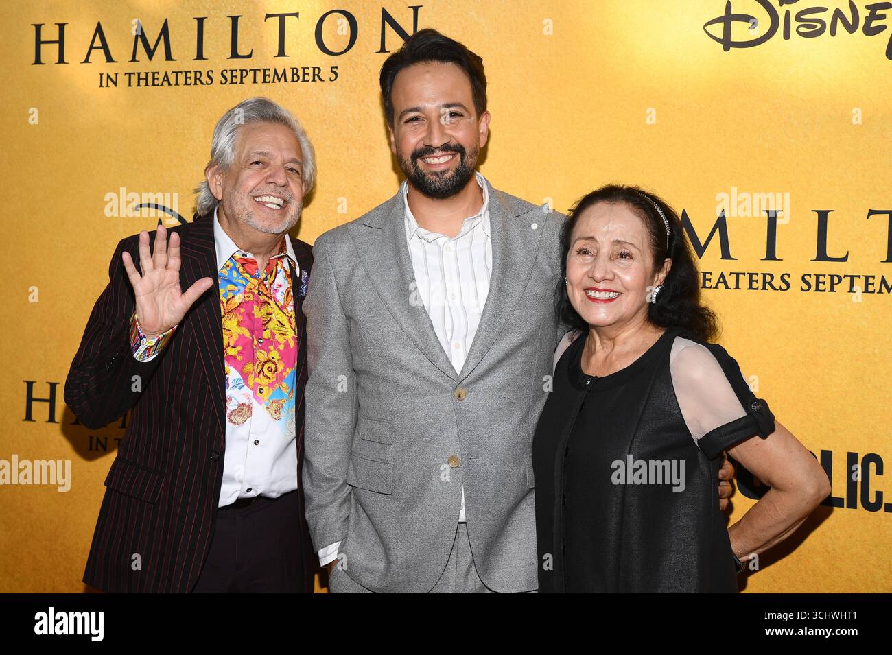 (L-R) Luis A. Miranda Jr, Lin-Manuel Miranda and Luz Towns-Miranda ...