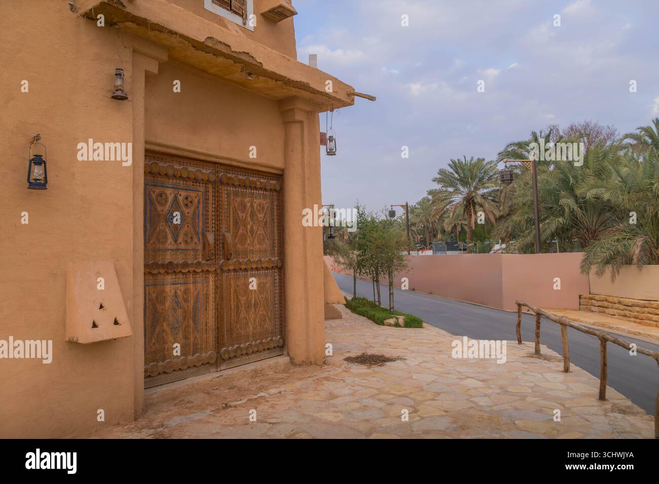 Wooden gate in mudbrick walls of Diriyah, Riyadh, Saudi Arabia ...