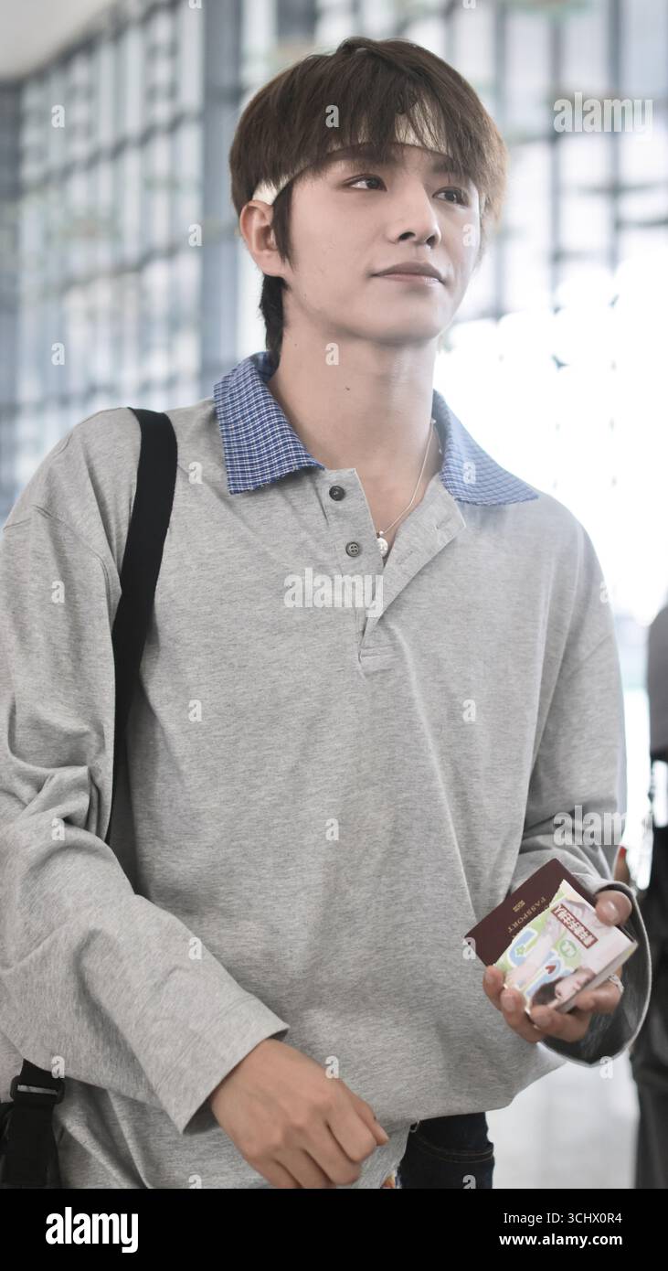 Chinese singer and dancer Wang Zihao appears at the airport in Hangzhou ...
