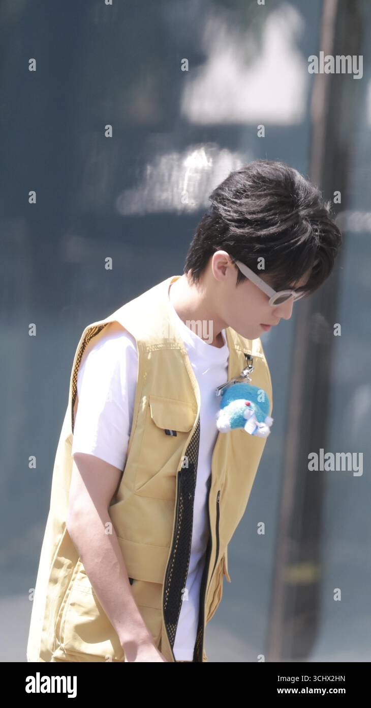 Chinese singer and actor Xu Longhan appears in Hangzhou City, east ...