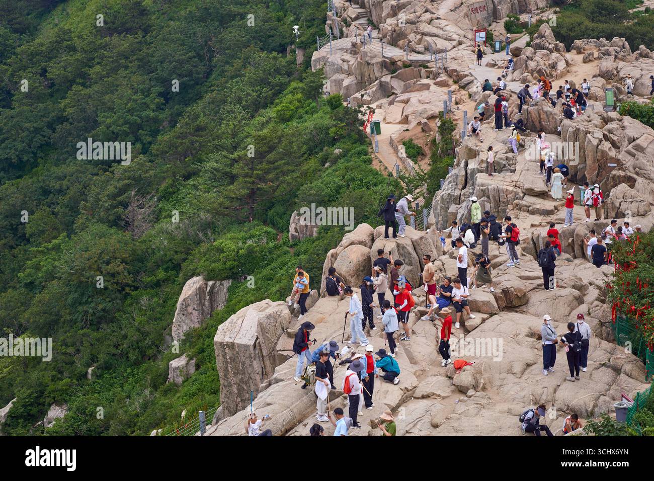 Crowded lookout cliff on the summit of Taishan or Mount Tai, the most ...