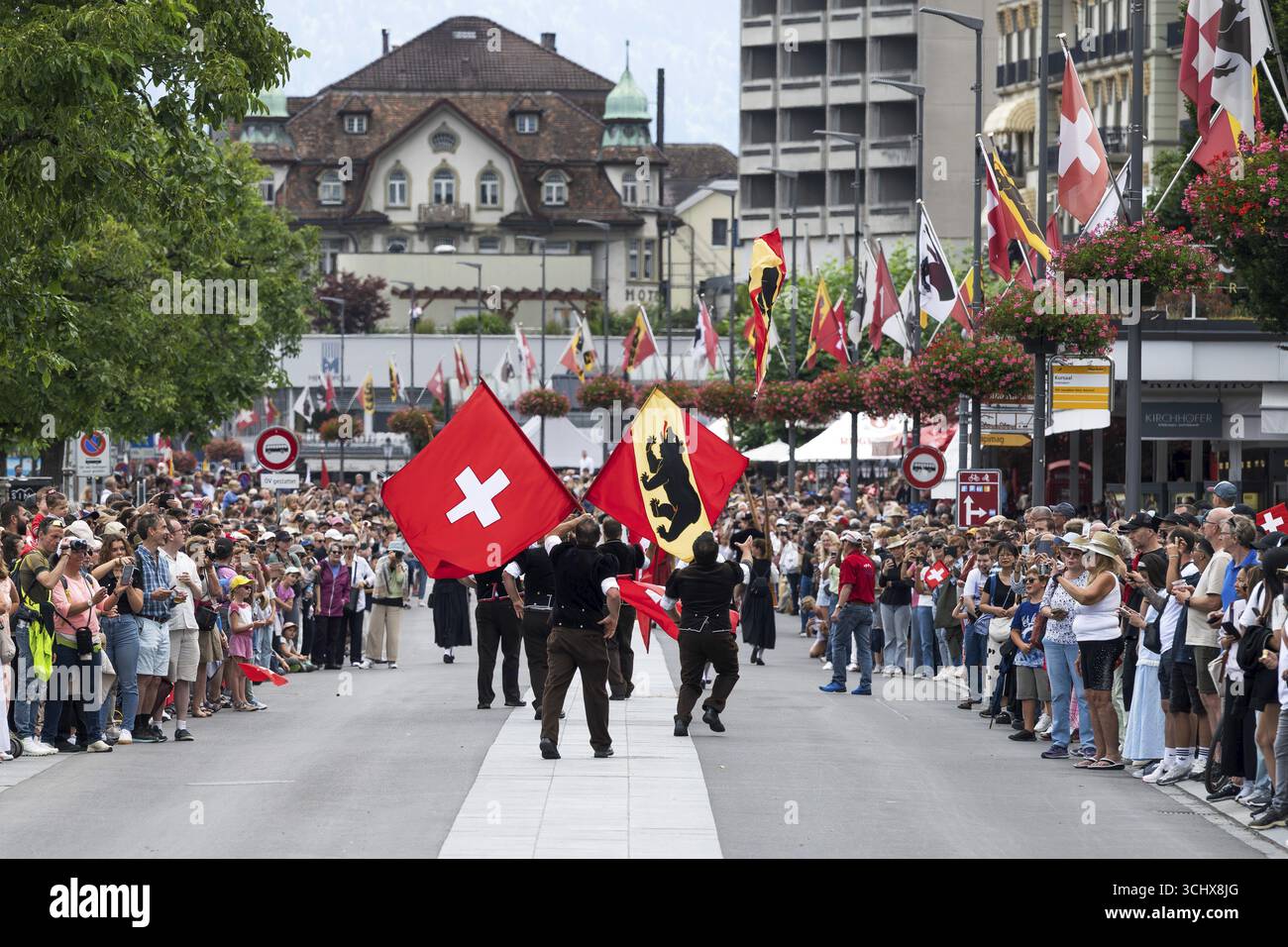 Swiss and Bernese flag wavers, Interlaken, Switzerland Stock Photo - Alamy