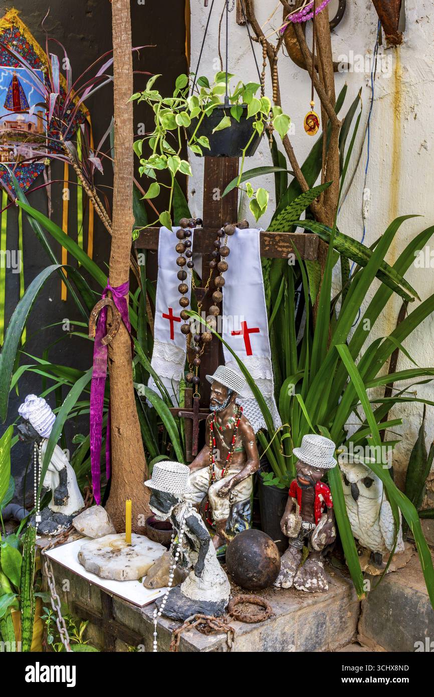 Religious syncretism of Umbanda and Cotolicism mixed on an altar among ...
