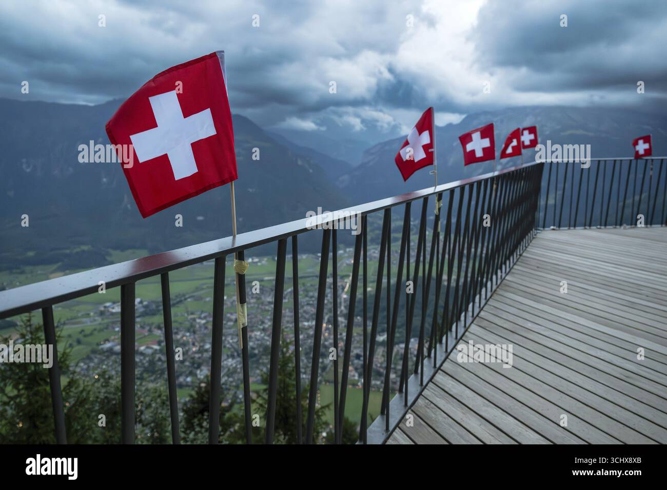 Swiss flags, Interlaken, Switzerland Stock Photo - Alamy